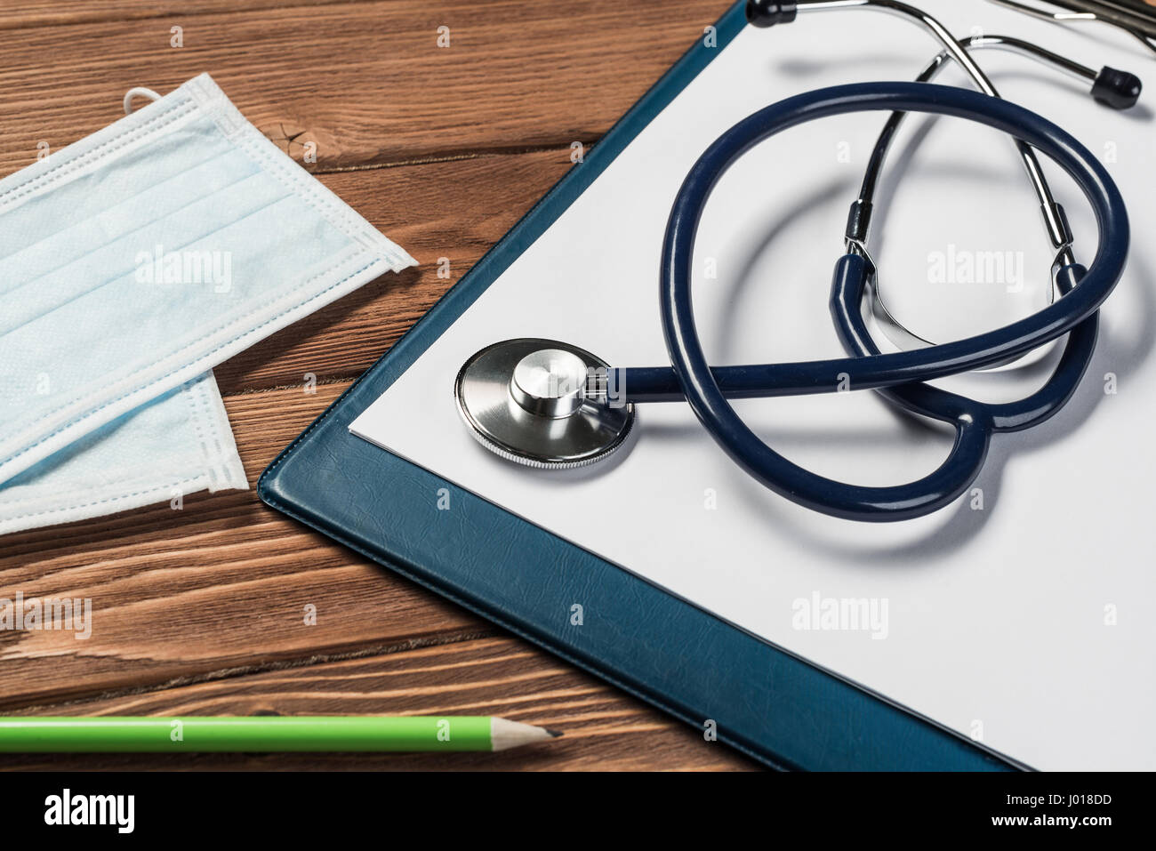 Desk of doctor with medicine things Stock Photo - Alamy