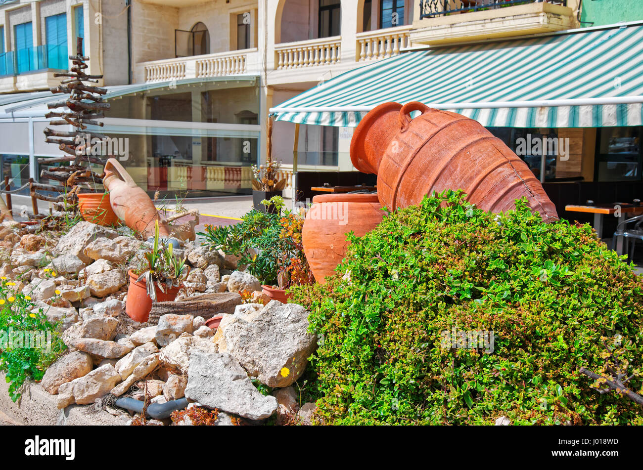 Clay pots in the street of Marsaxlokk, Malta island Stock Photo - Alamy