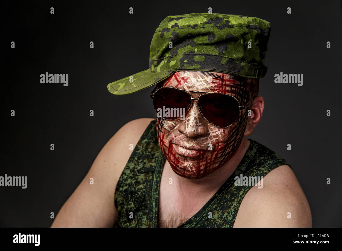 Portrait of Soldier with Military Style Camouflage on a Face. Portrait ...