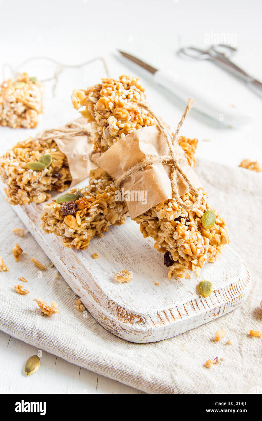 Organic homemade granola bars on rustic wooden background - Healthy ...
