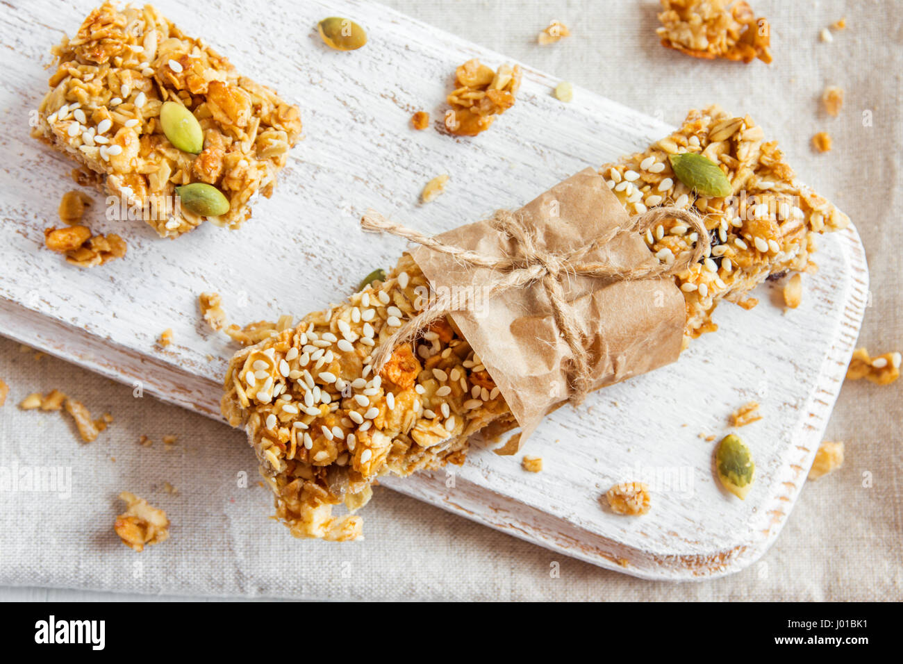 Organic homemade granola bars on rustic wooden background - Healthy ...