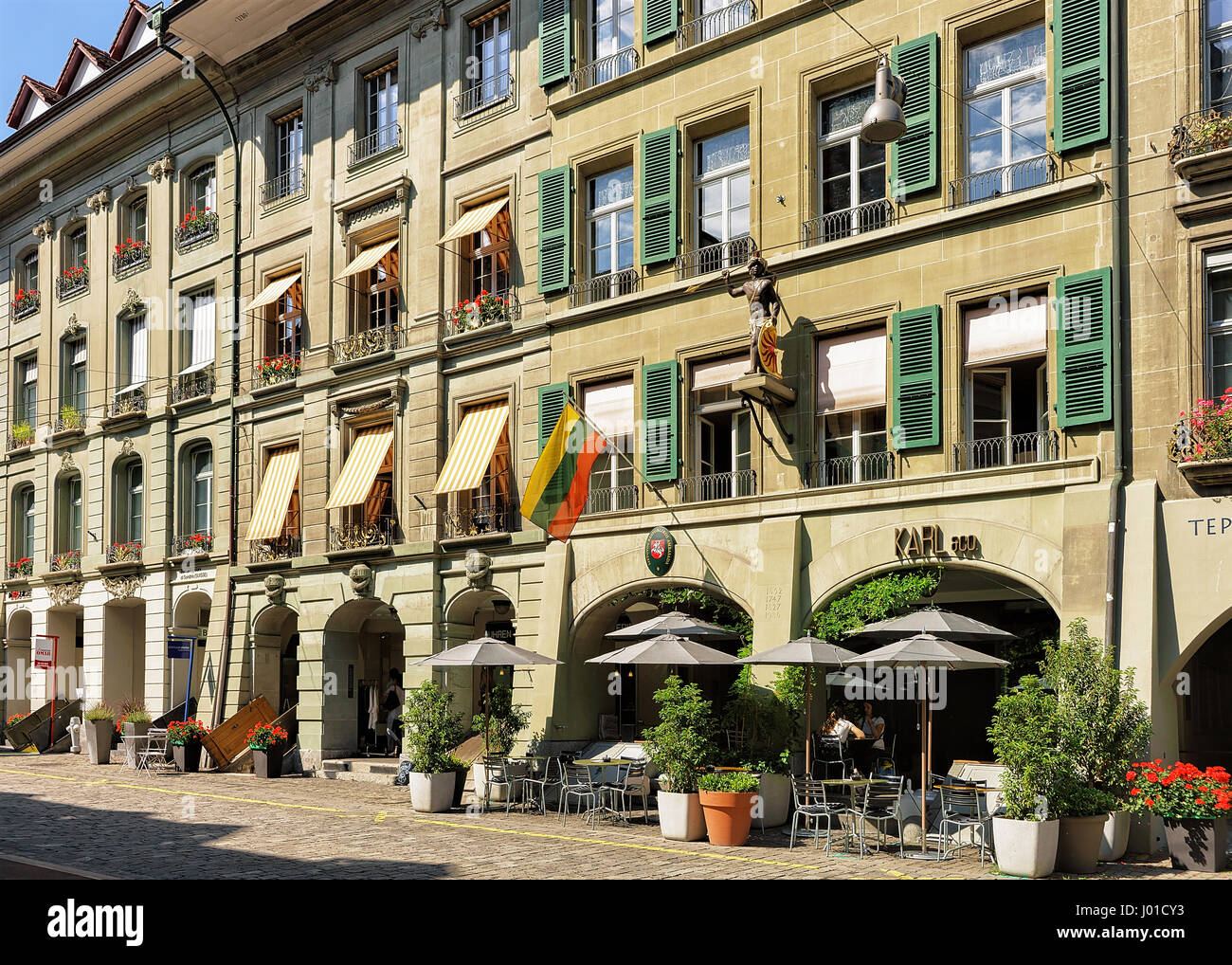Bern, Switzerland - August 31, 2016: Cafe at Kramgasse street with ...