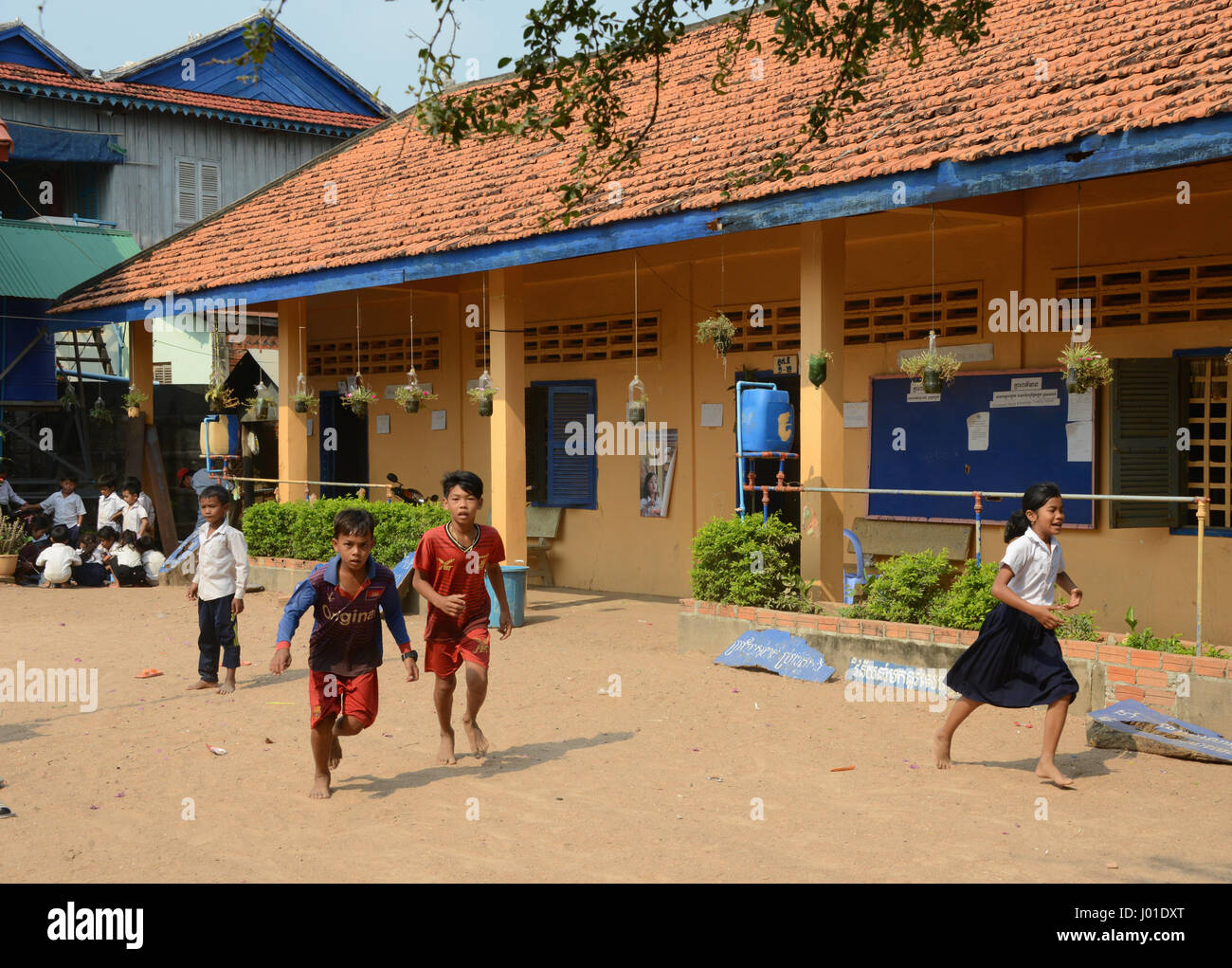 Cambodian children playing in river hi-res stock photography and images ...