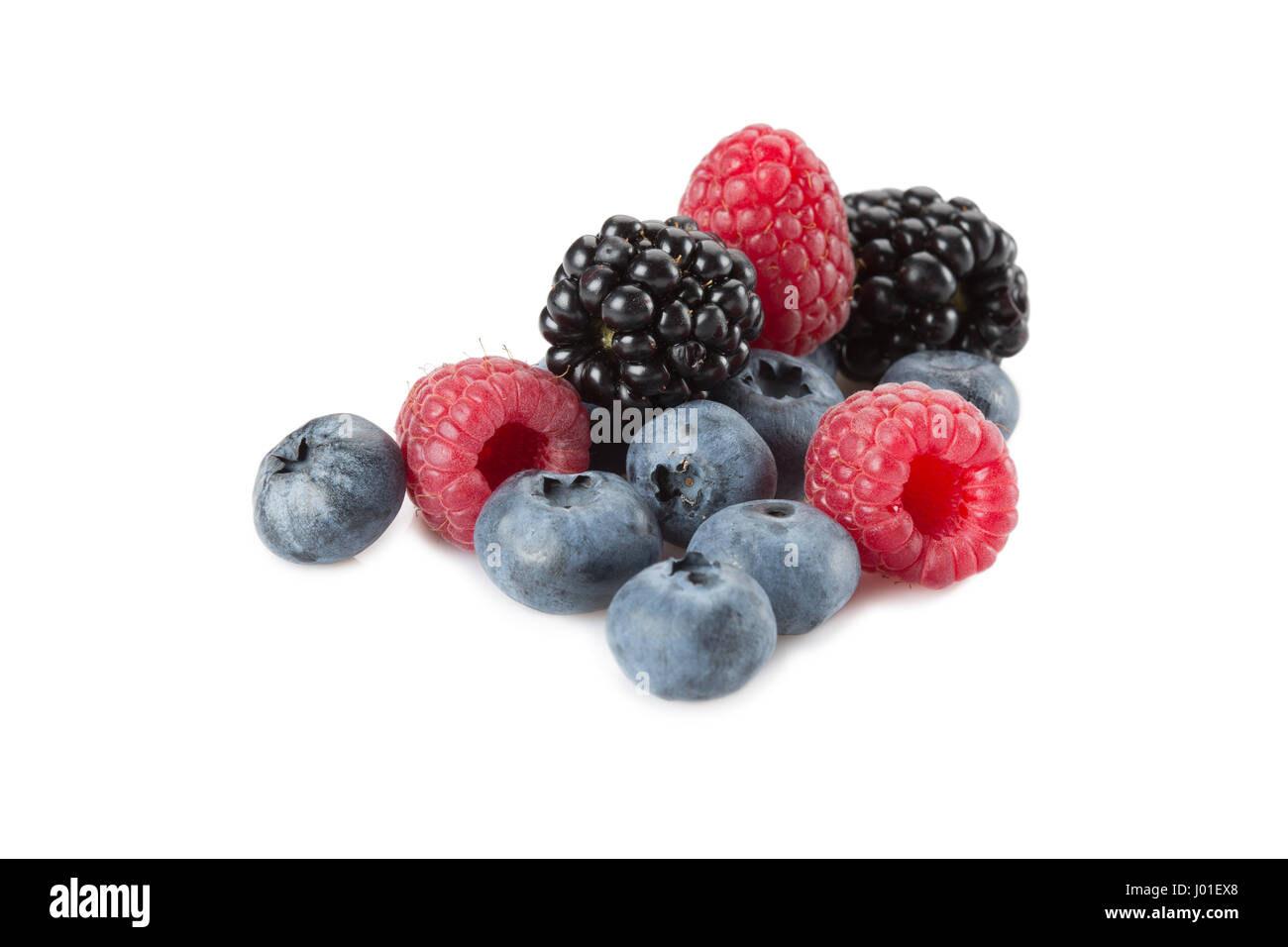 Mix of different berries on a white background Stock Photo - Alamy