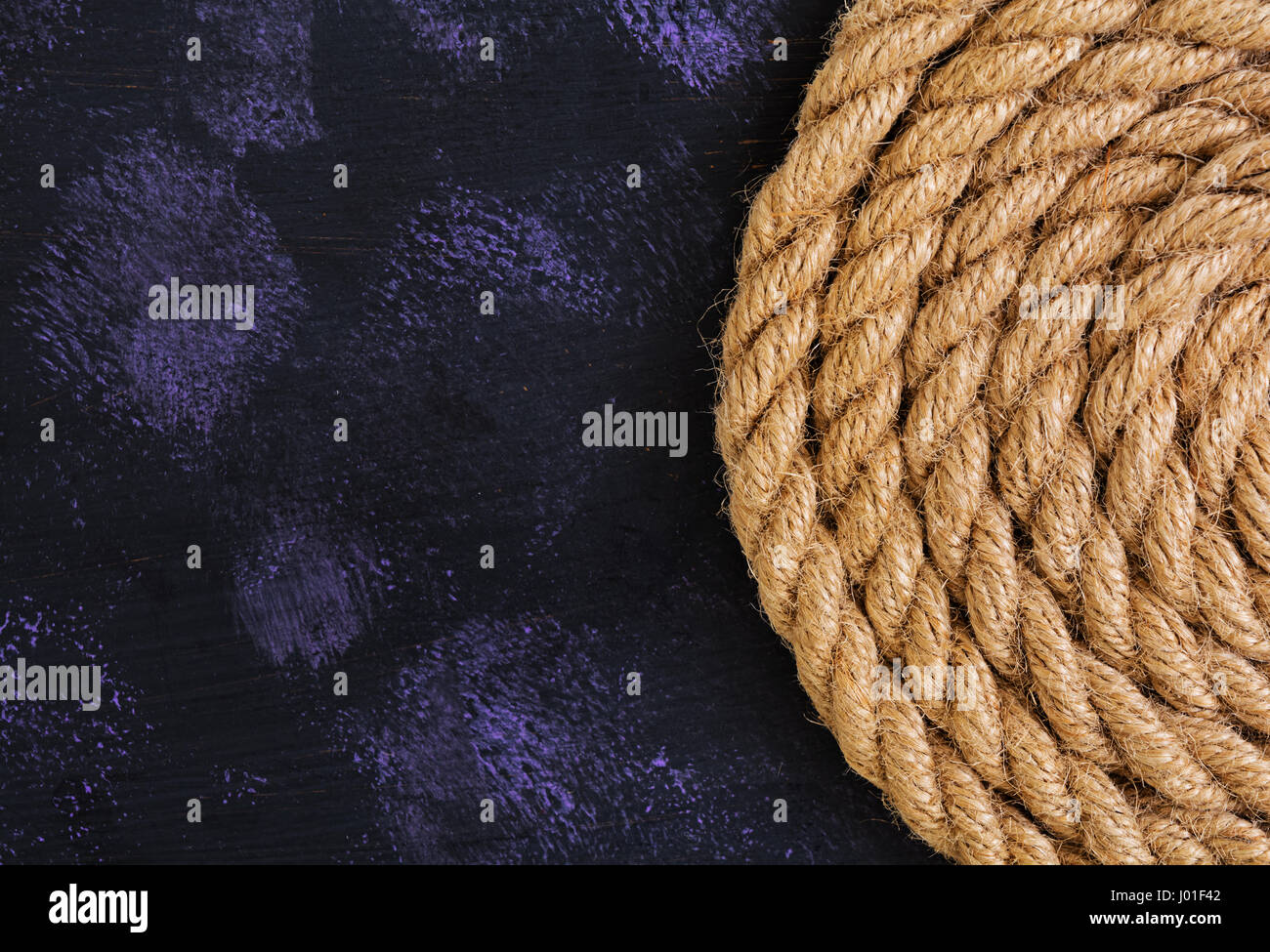 Rope on dark background. Top view Stock Photo - Alamy