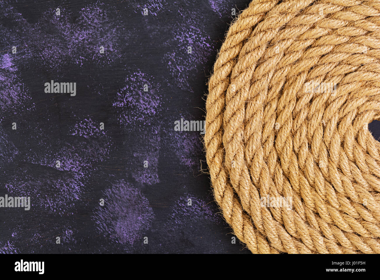 Rope on dark background. Top view Stock Photo - Alamy