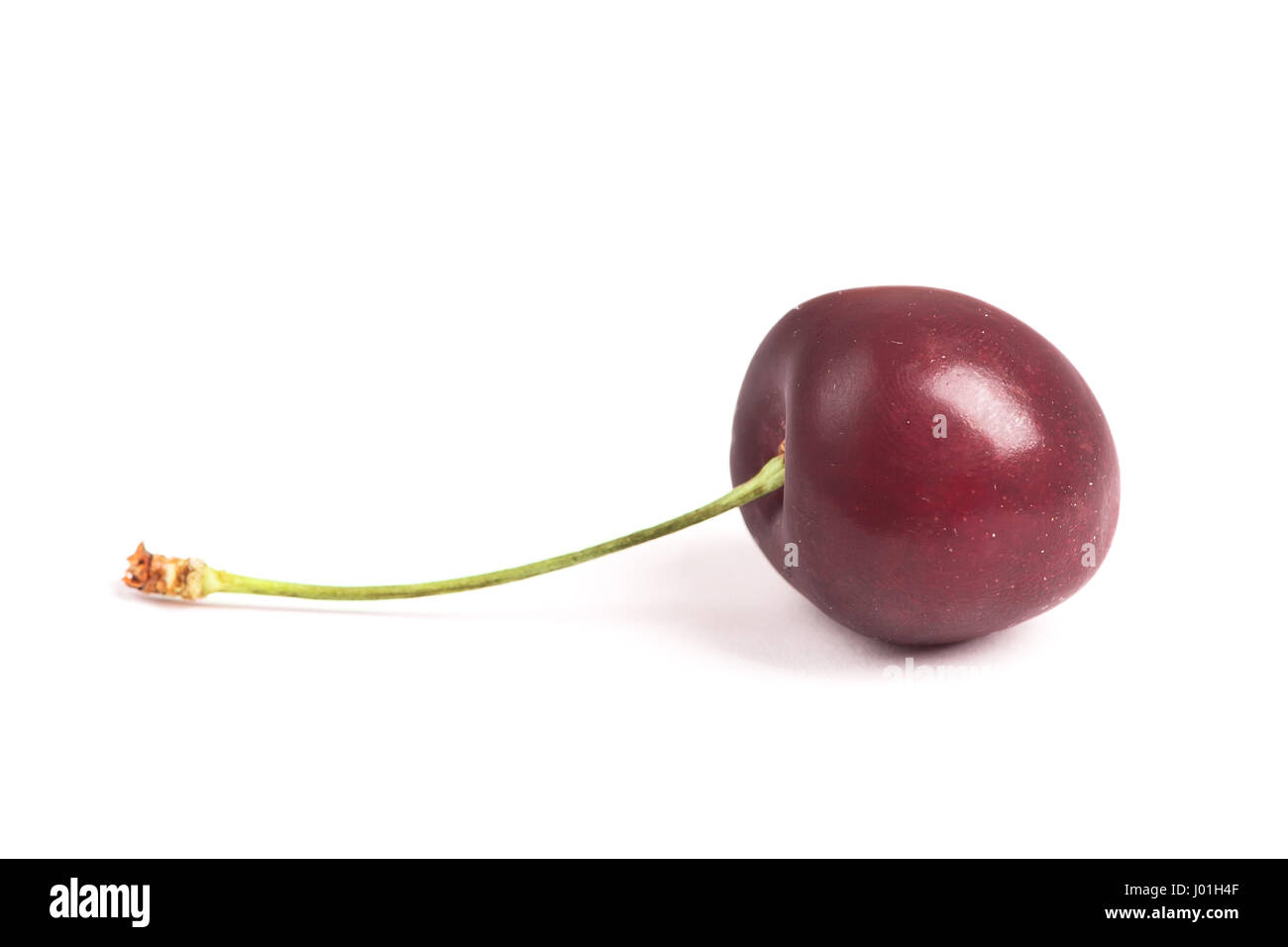 Single ripe cherry isolated on white background Stock Photo - Alamy