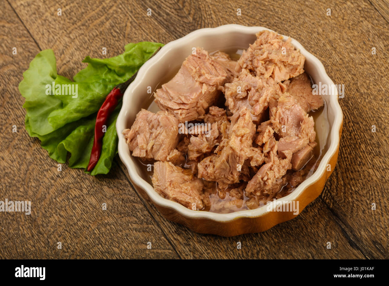 Canned tuna fish in the bowl ready for cooking Stock Photo - Alamy