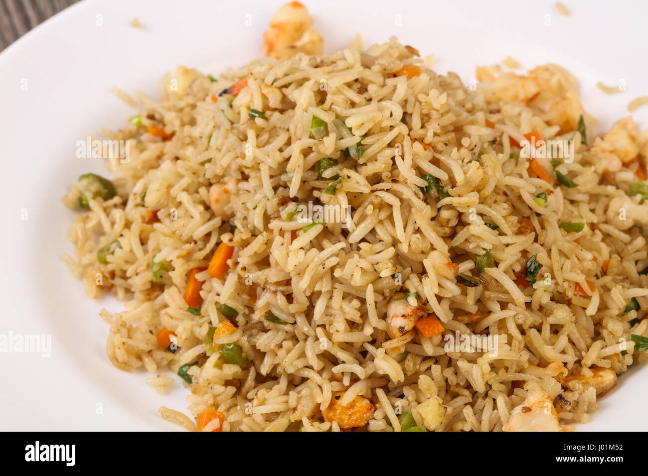 Indian traditional cuisine - Fried rice with prawn Stock Photo - Alamy