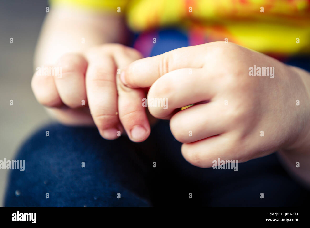 detail of child hands - young boy Stock Photo - Alamy