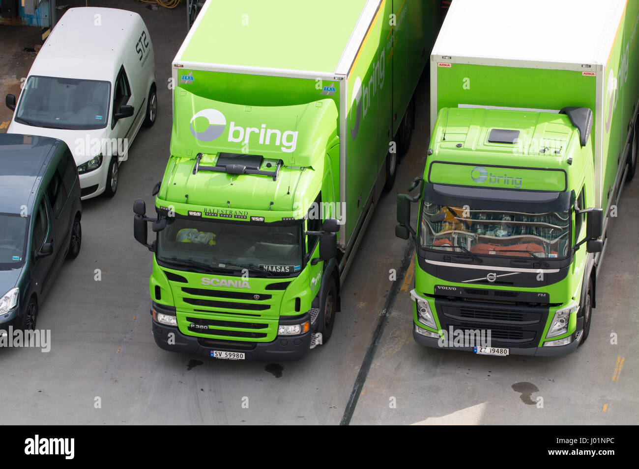BRING: Green trucks in a Norwegian depot Stock Photo - Alamy