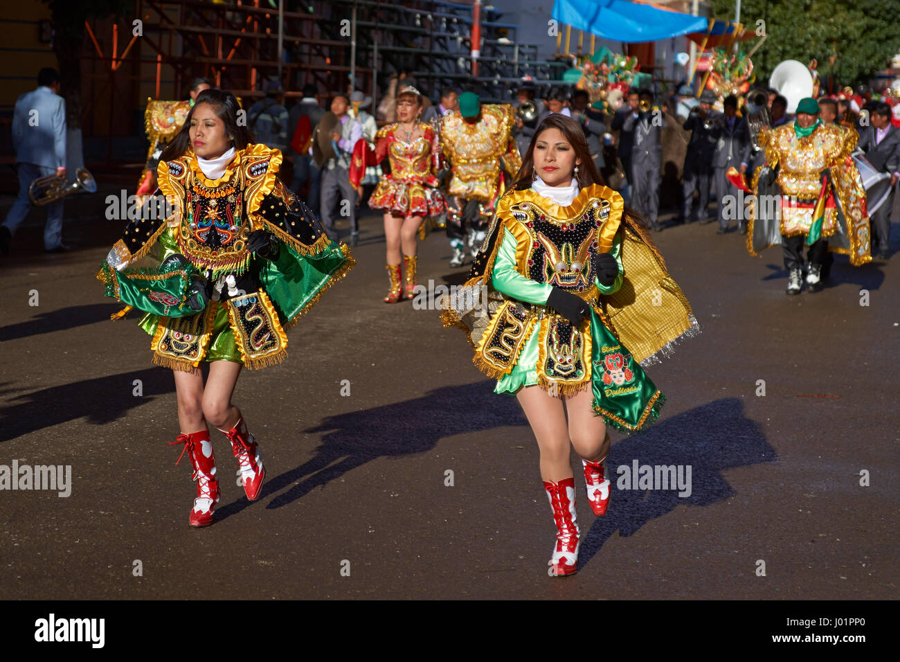 Diablada dancers in ornate costumes parade through the mining city of ...