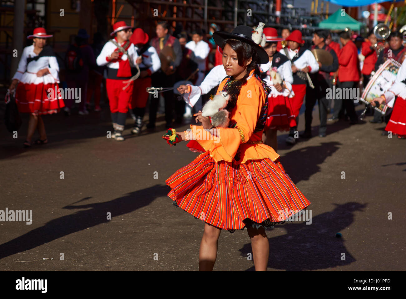 Llamerada dancers in ornate costumes performing as they parade through ...