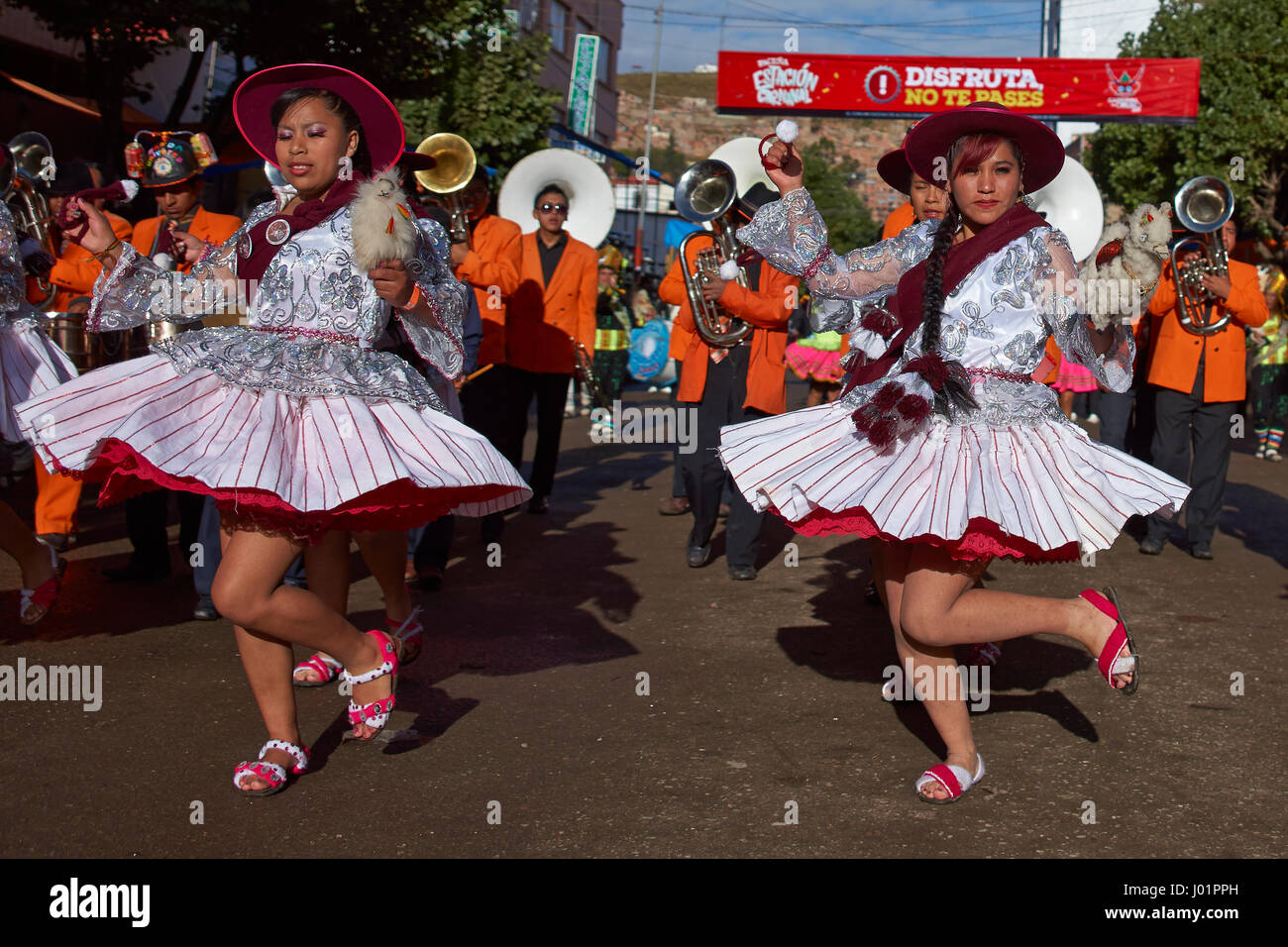 Llamerada dancers in ornate costumes performing as they parade through ...