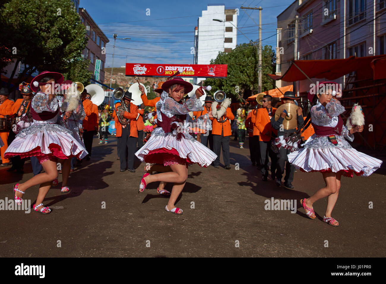 Llamerada dancers in ornate costumes performing as they parade through ...