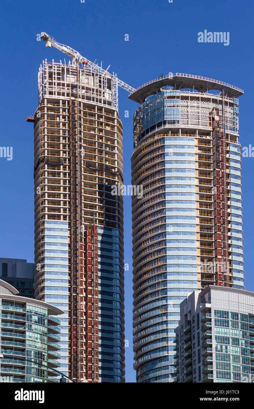 hi-rise buildings under construction in a big city Stock Photo - Alamy
