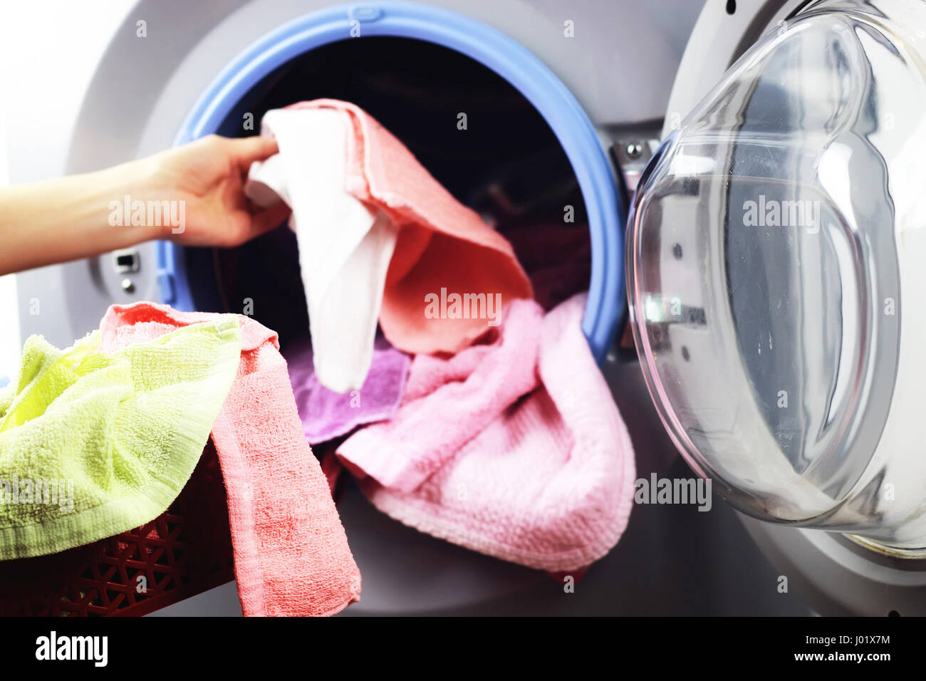machine Washer hand put Stock Photo - Alamy