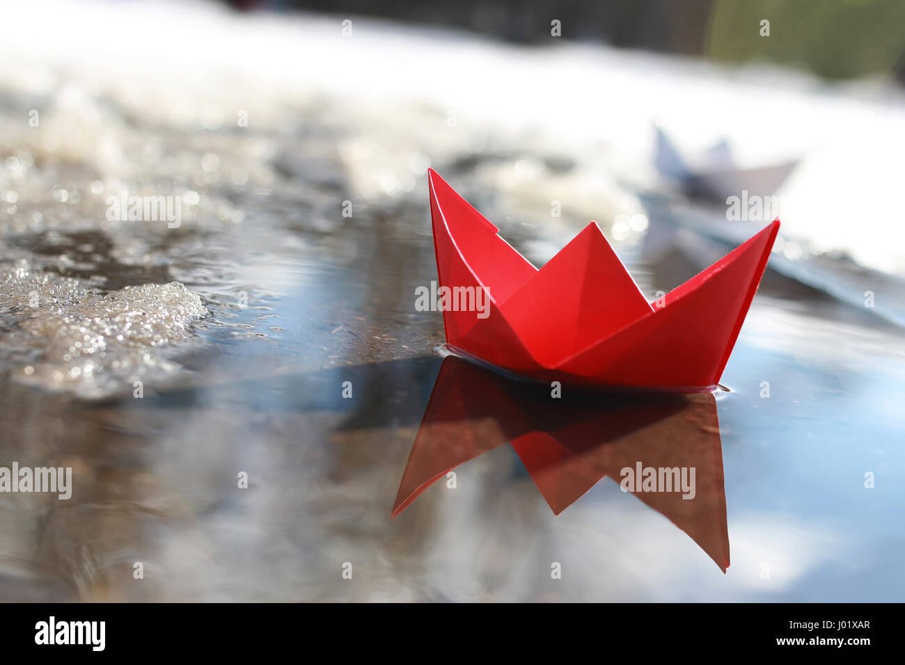 paper boat in a pool Stock Photo - Alamy
