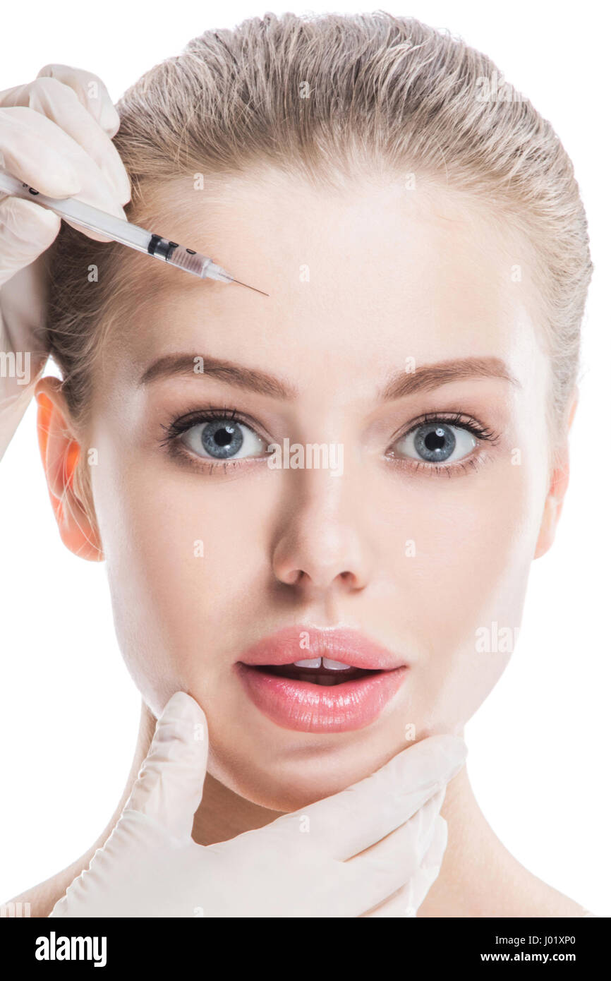 Cosmetic injection to female face isolated on white background Stock ...