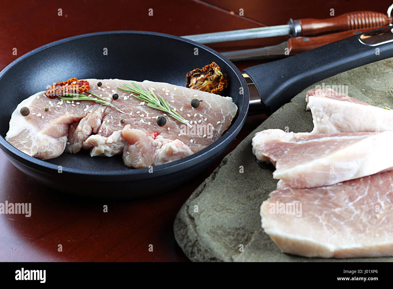 steak in a frying pan Stock Photo - Alamy
