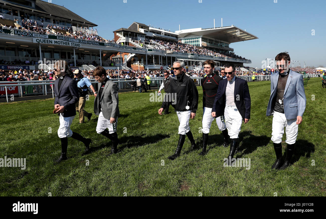 Ruby Walsh (centre) and other jockeys walking the Grand National course ...