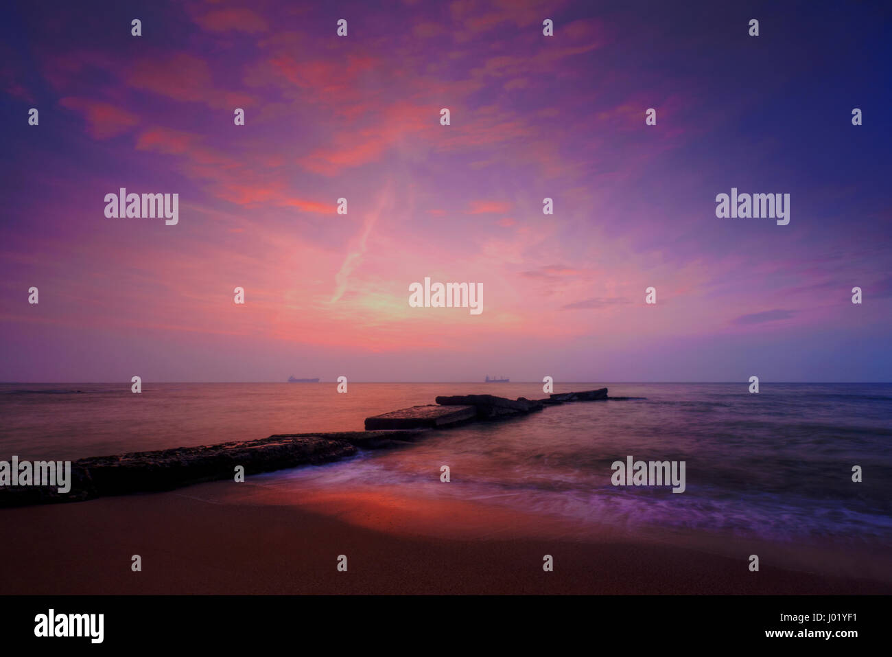 Beautiful sunrise over the sea with dramatic clouds on the sky Stock ...
