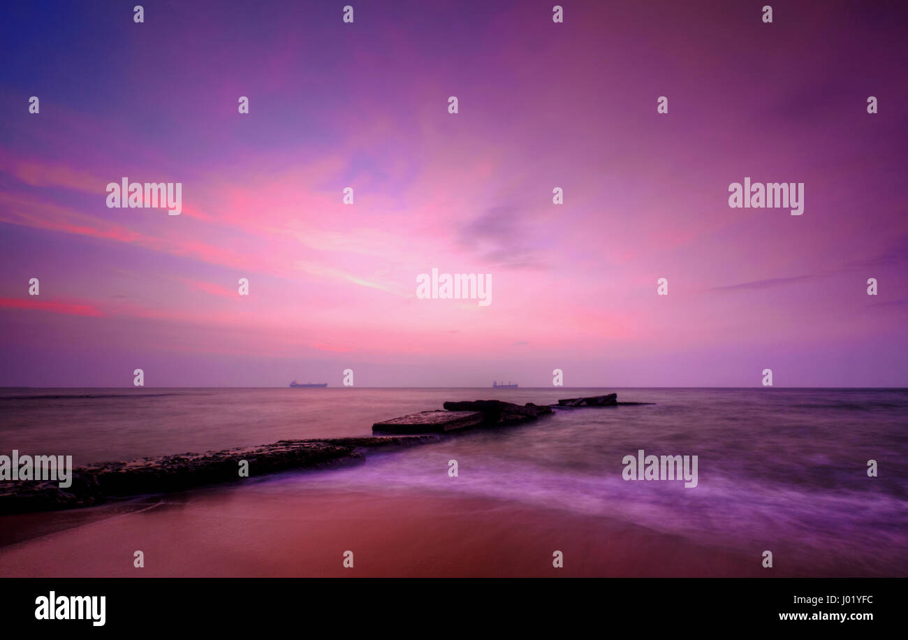 Beautiful sunrise over the sea with dramatic clouds on the sky Stock ...
