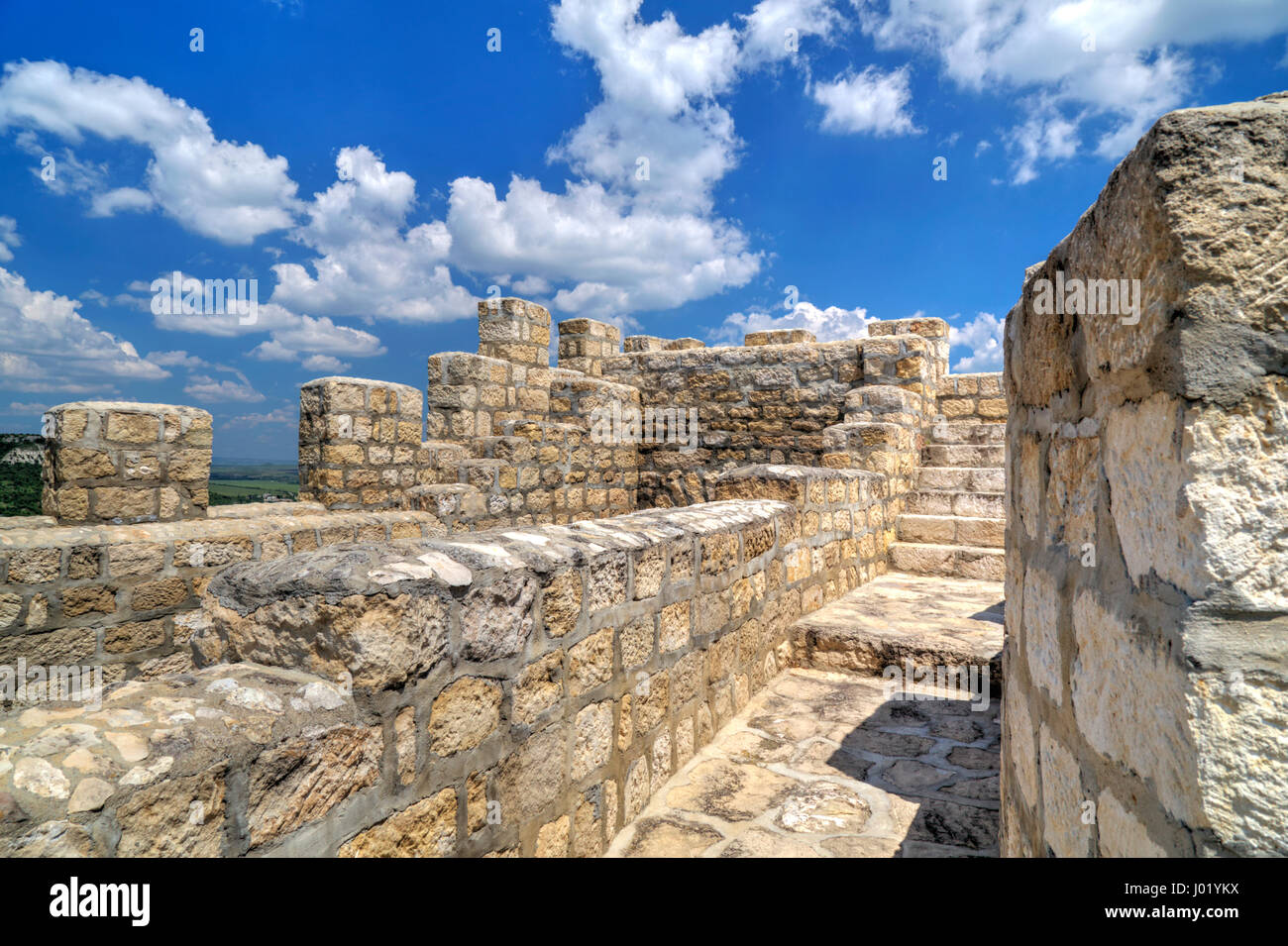 Stone walls and gate of ancient fortress Stock Photo - Alamy