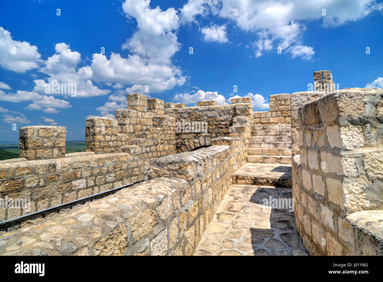 Stone walls and gate of ancient fortress Stock Photo - Alamy