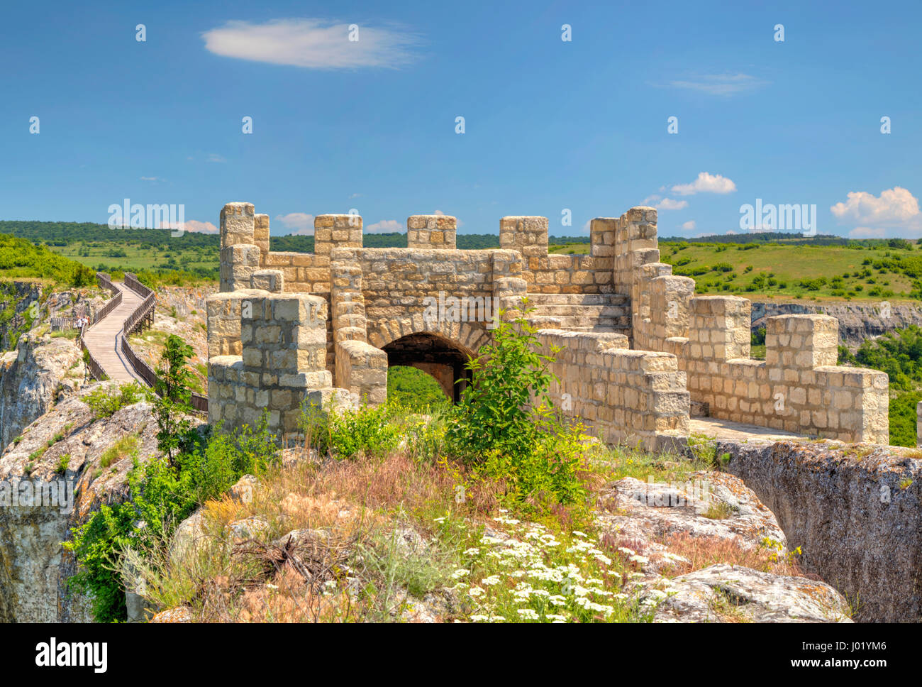 Stone walls and gate of ancient fortress Stock Photo - Alamy