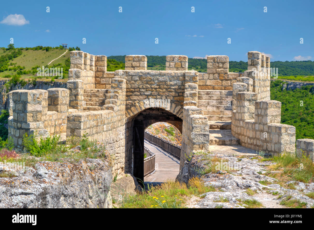 Stone walls and gate of ancient fortress Stock Photo - Alamy