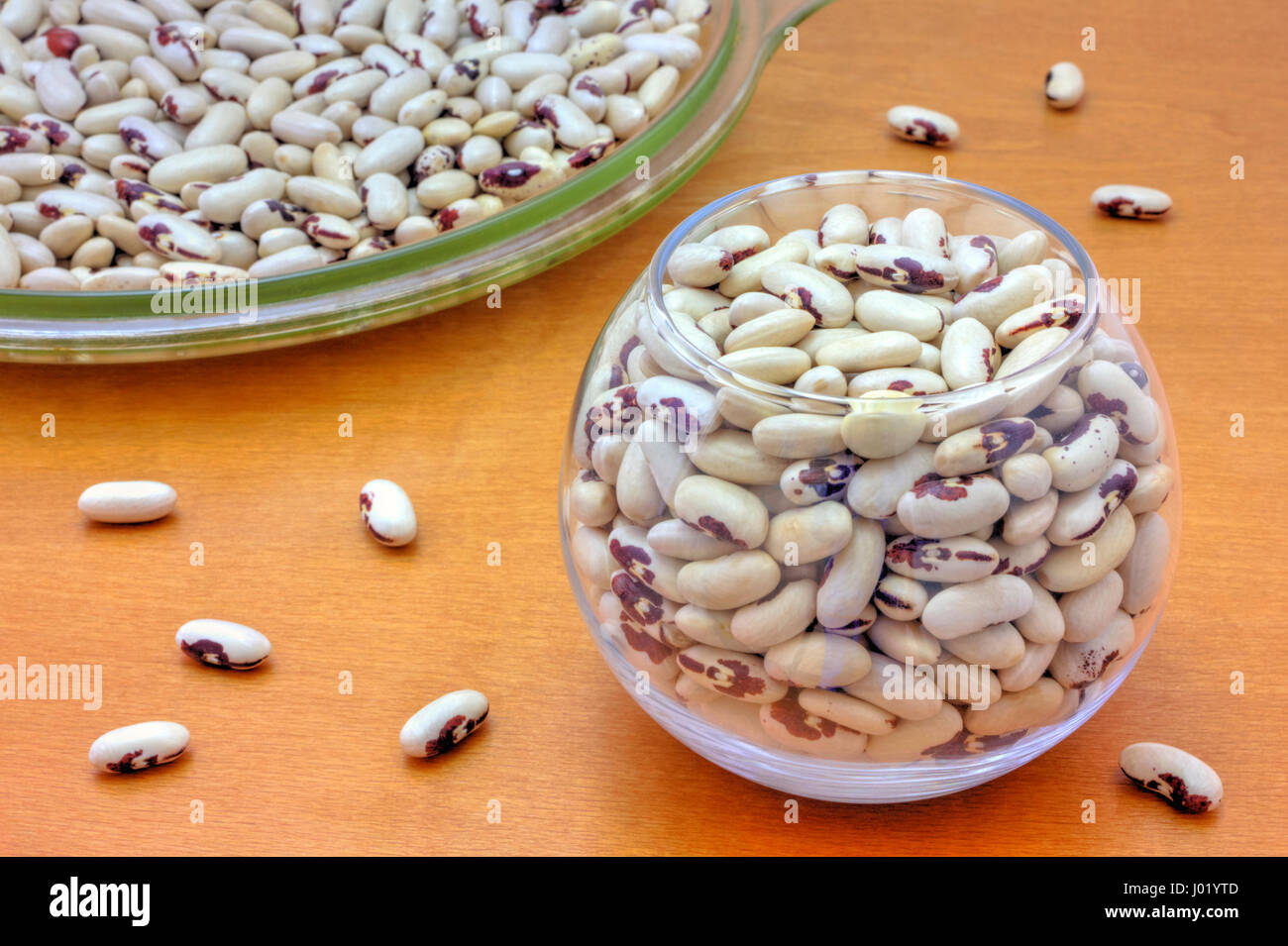 Colorful haricot beans in glass bowls on wooden background Stock Photo ...