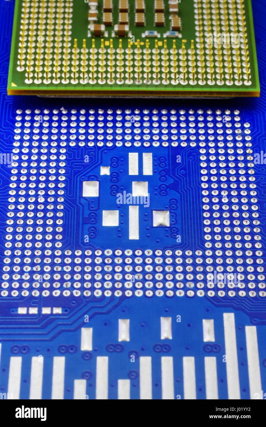 Technological background with blue computer motherboard and central ...