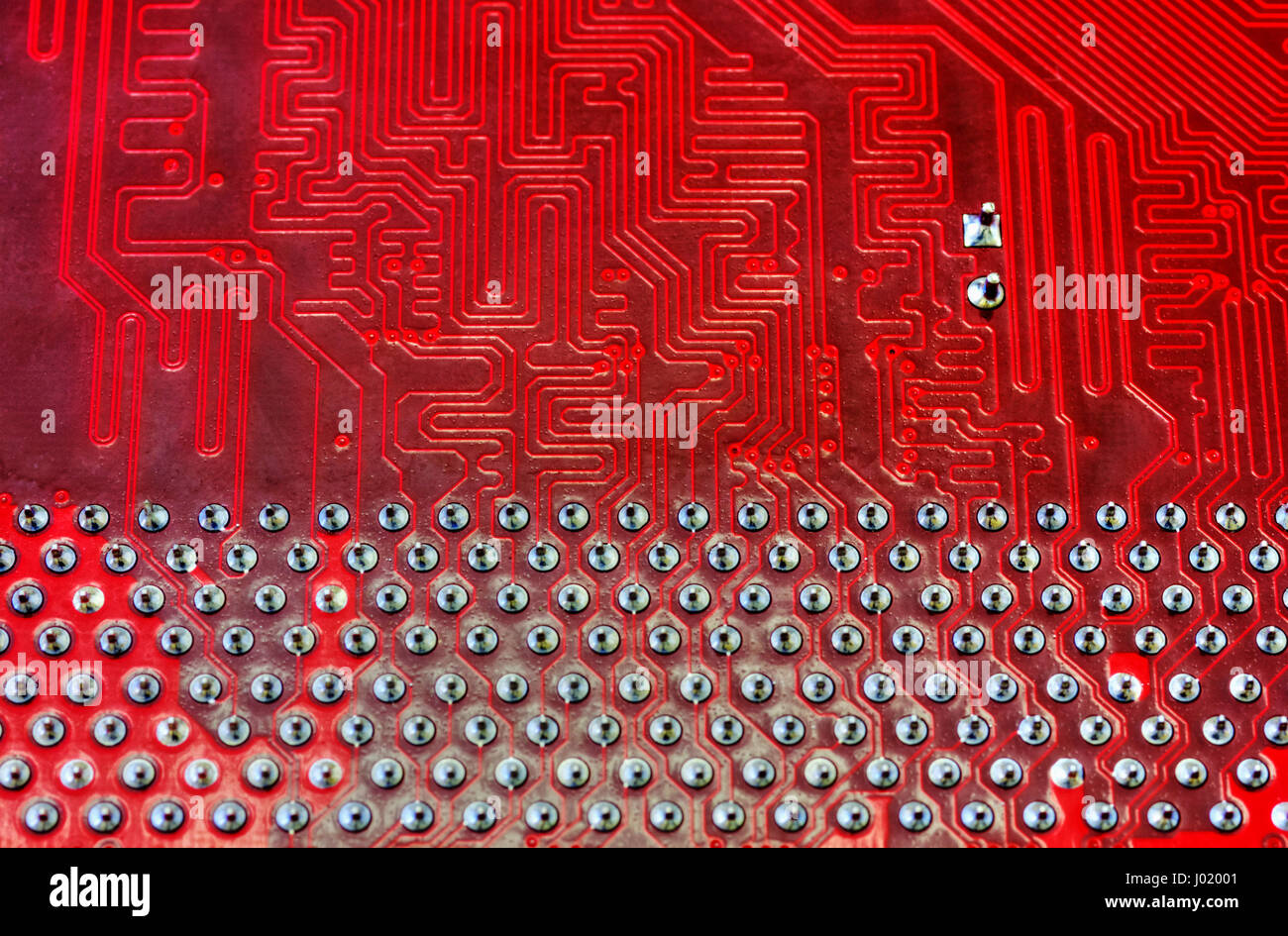 Technological background with red computer motherboard closeup Stock ...