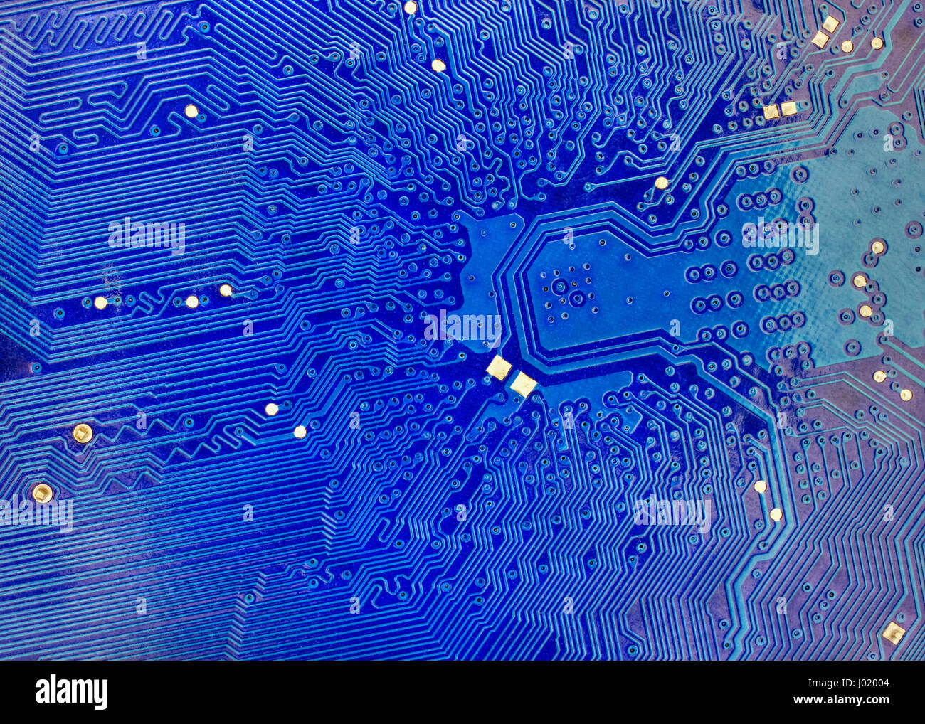 Technological background with blue computer motherboard closeup Stock ...