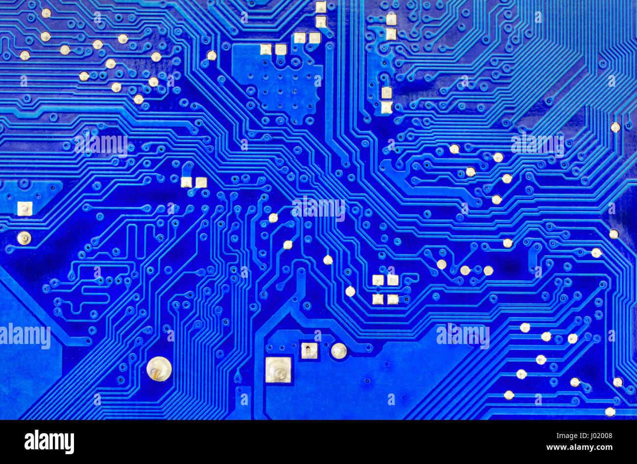 Technological background with blue computer motherboard closeup Stock ...