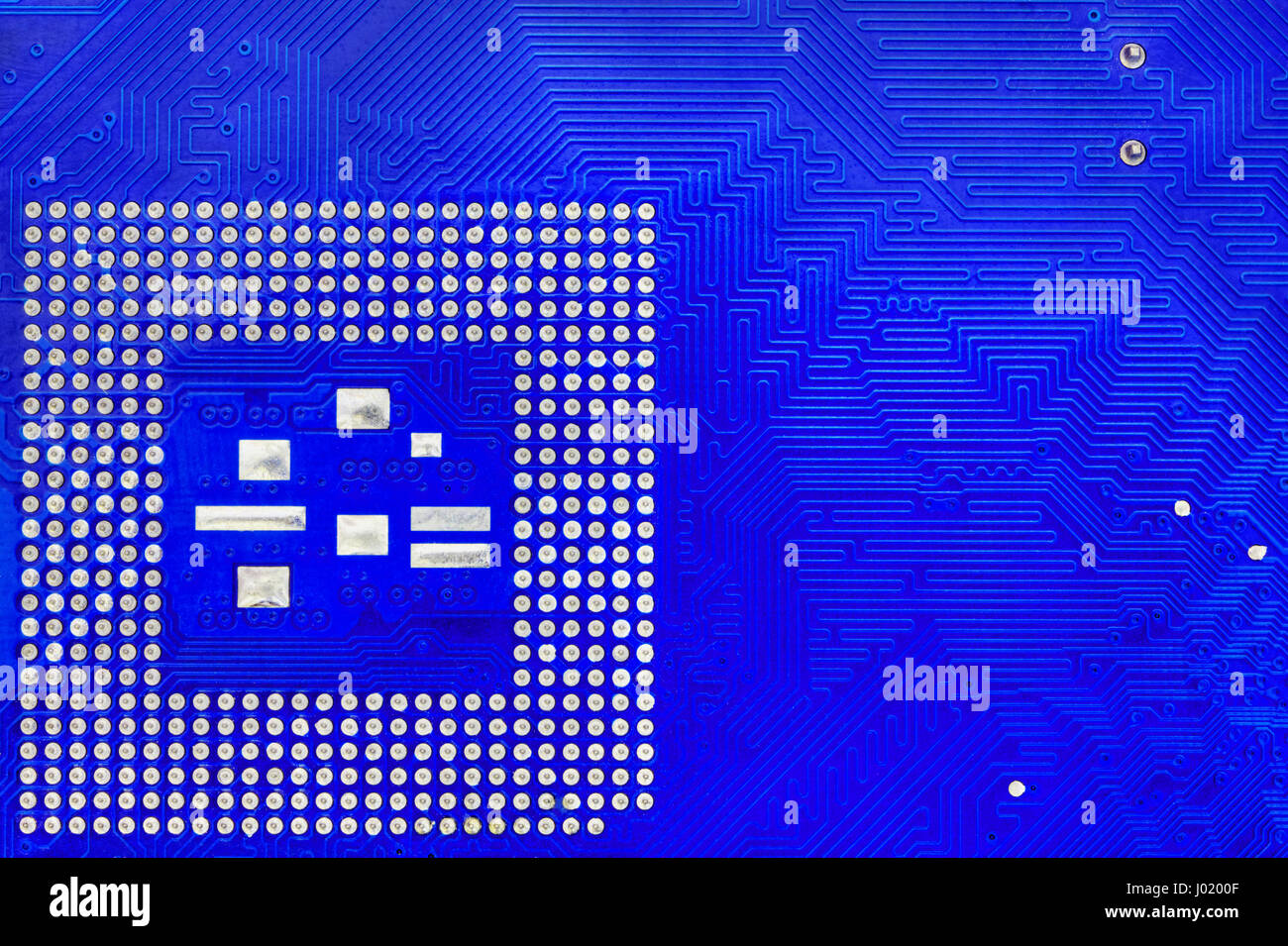 Technological background with blue computer motherboard closeup Stock ...