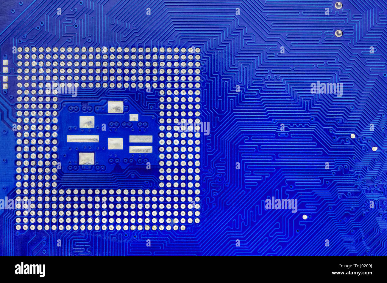 Technological background with blue computer motherboard closeup Stock ...