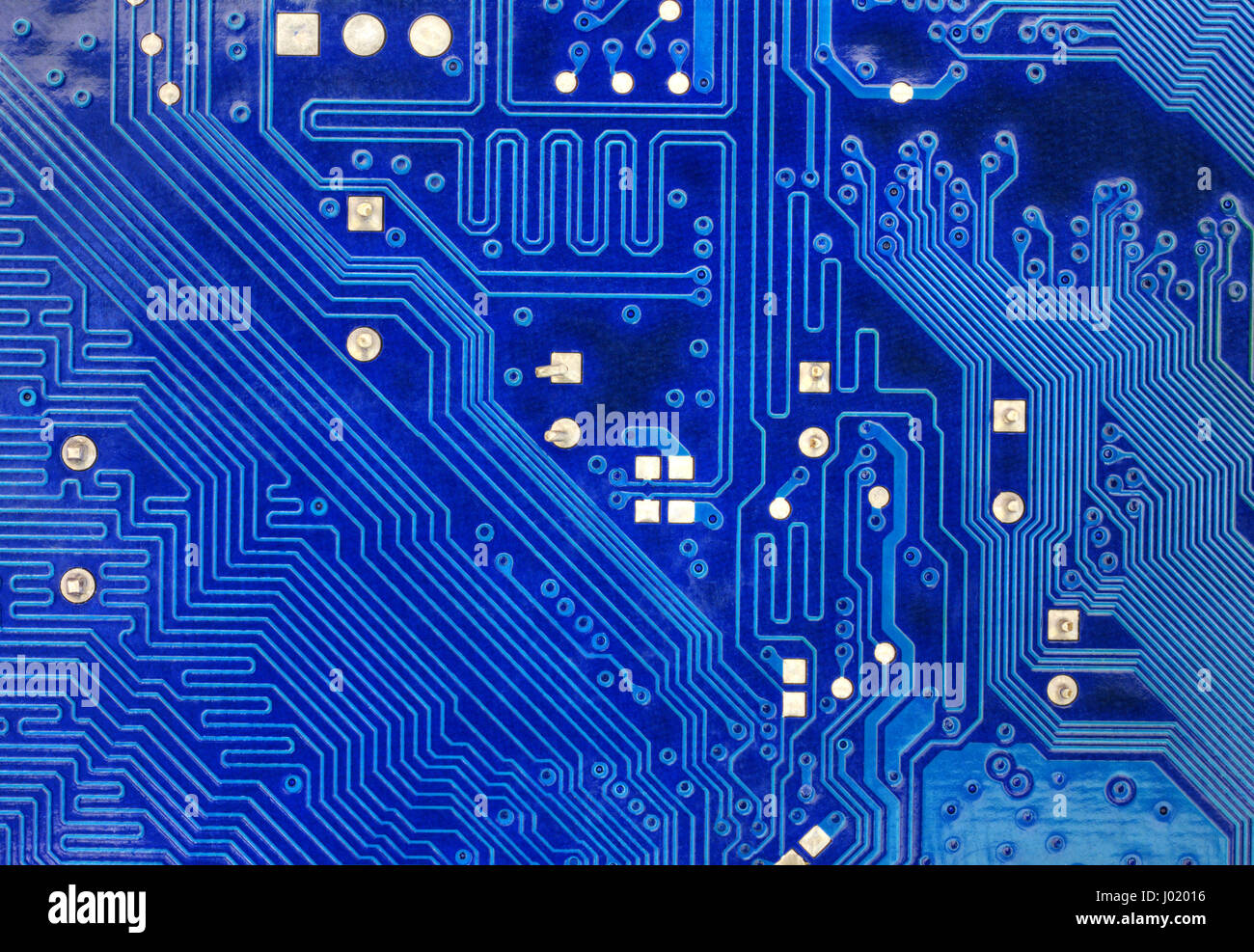 Technological background with blue computer motherboard closeup Stock ...