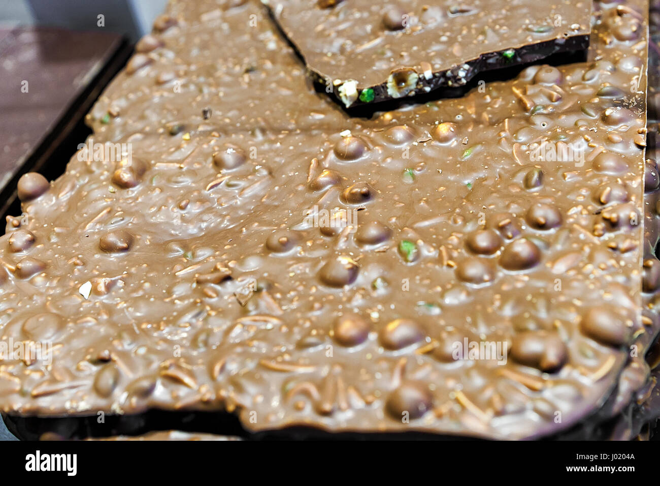 Selection of Swiss chocolate bars with hazelnuts and pistachio Stock ...