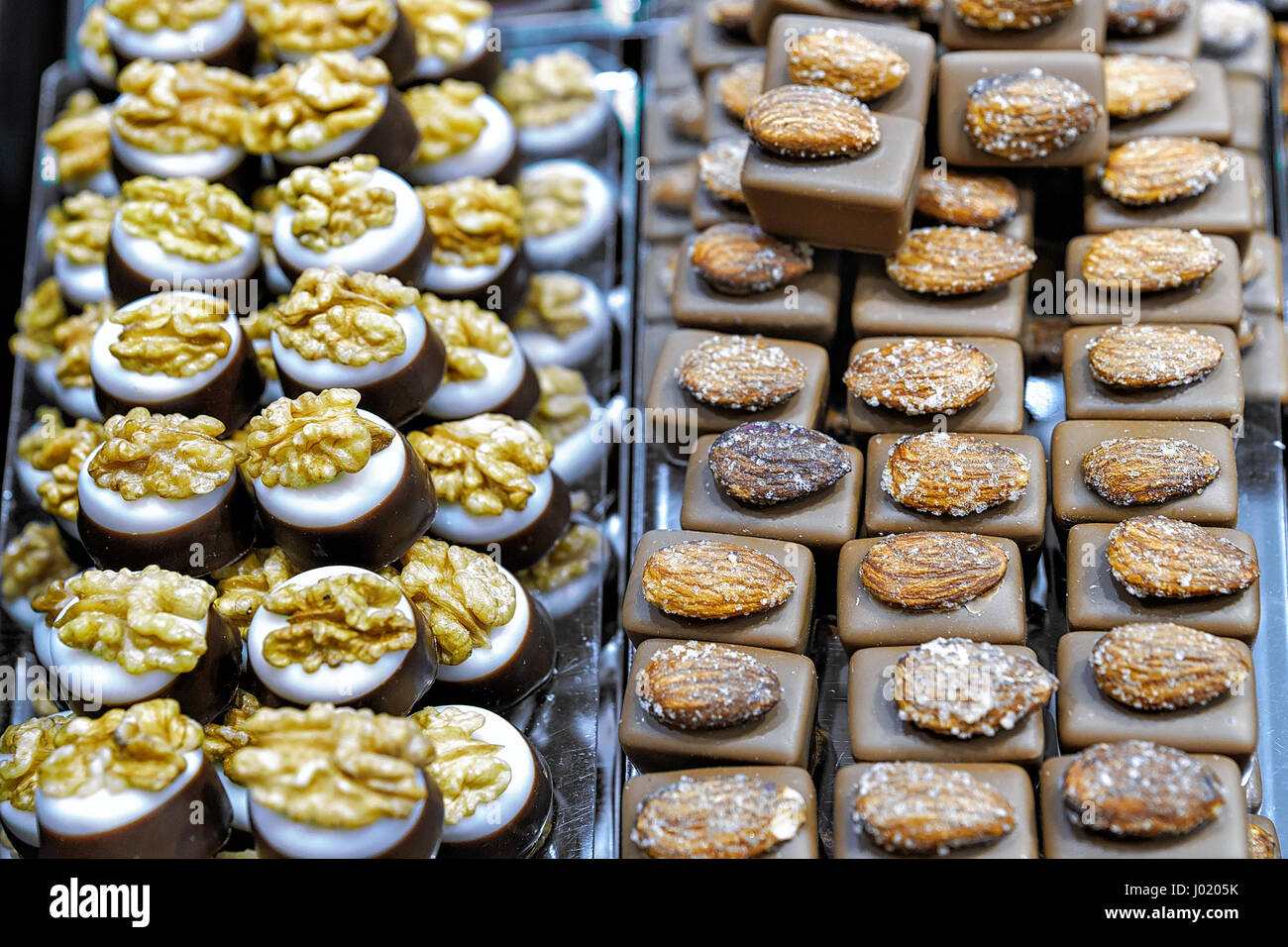 Selection of Swiss chocolate sweets with almond and walnut Stock Photo ...