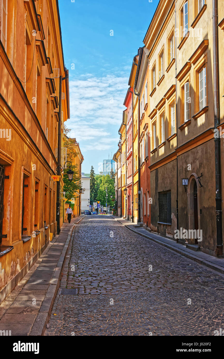 One of the main Streets in Warsaw city center, Poland. People on the ...