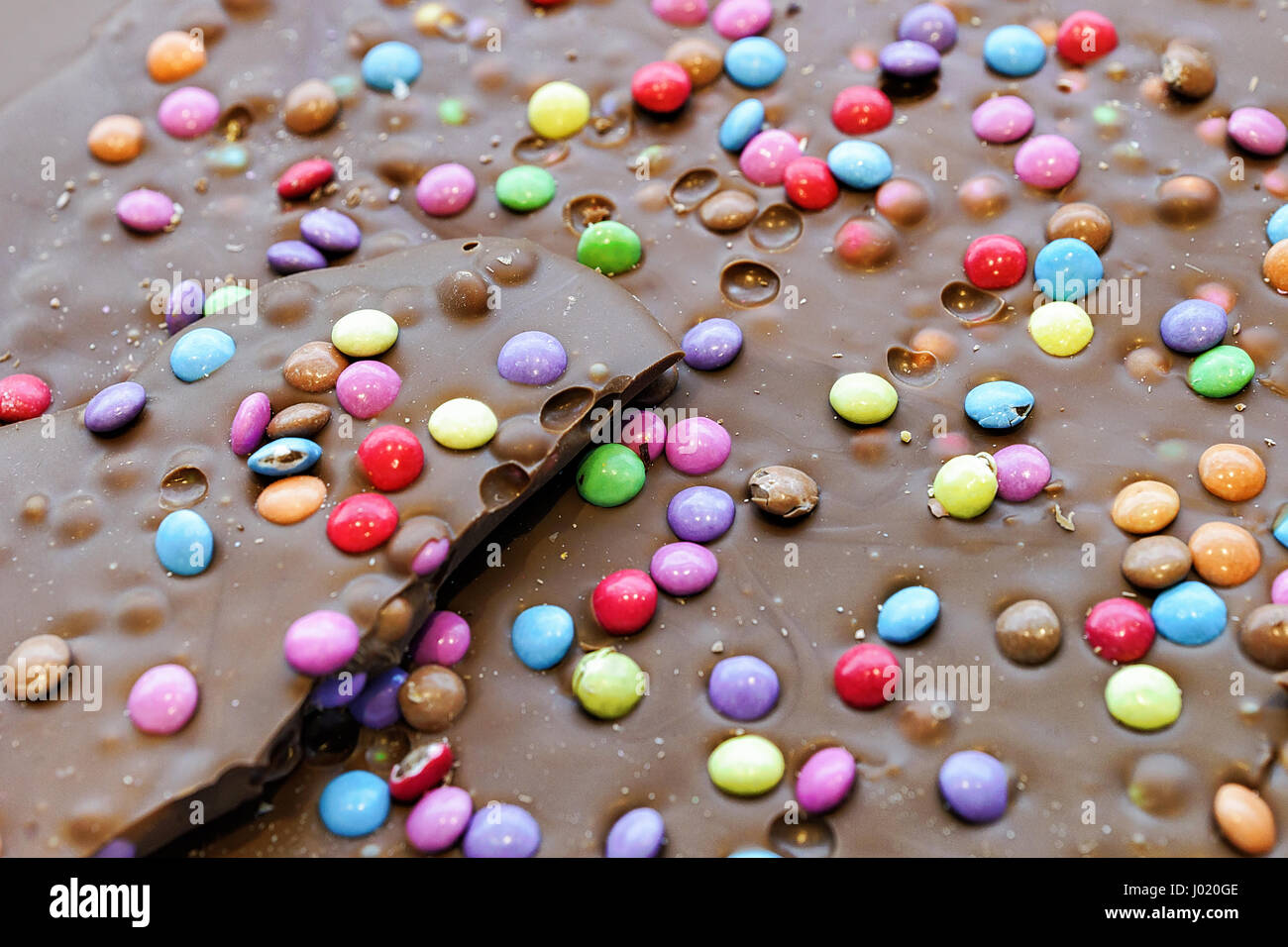 Swiss chocolate bars with candy Stock Photo - Alamy