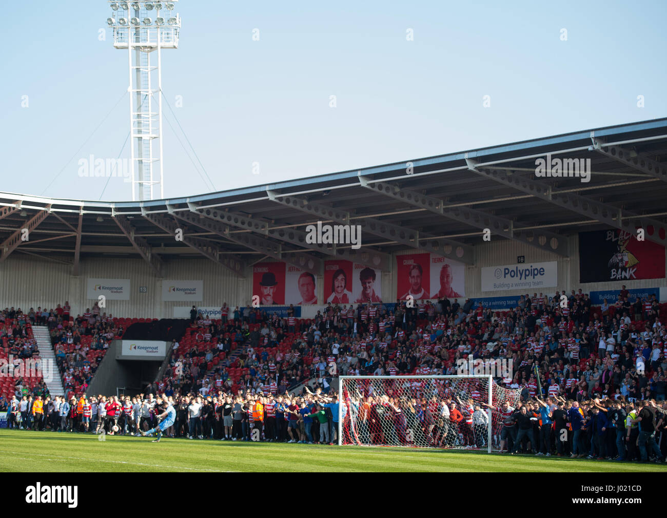 Doncaster Rovers fans get ready to invade the pitch to celebrate ...