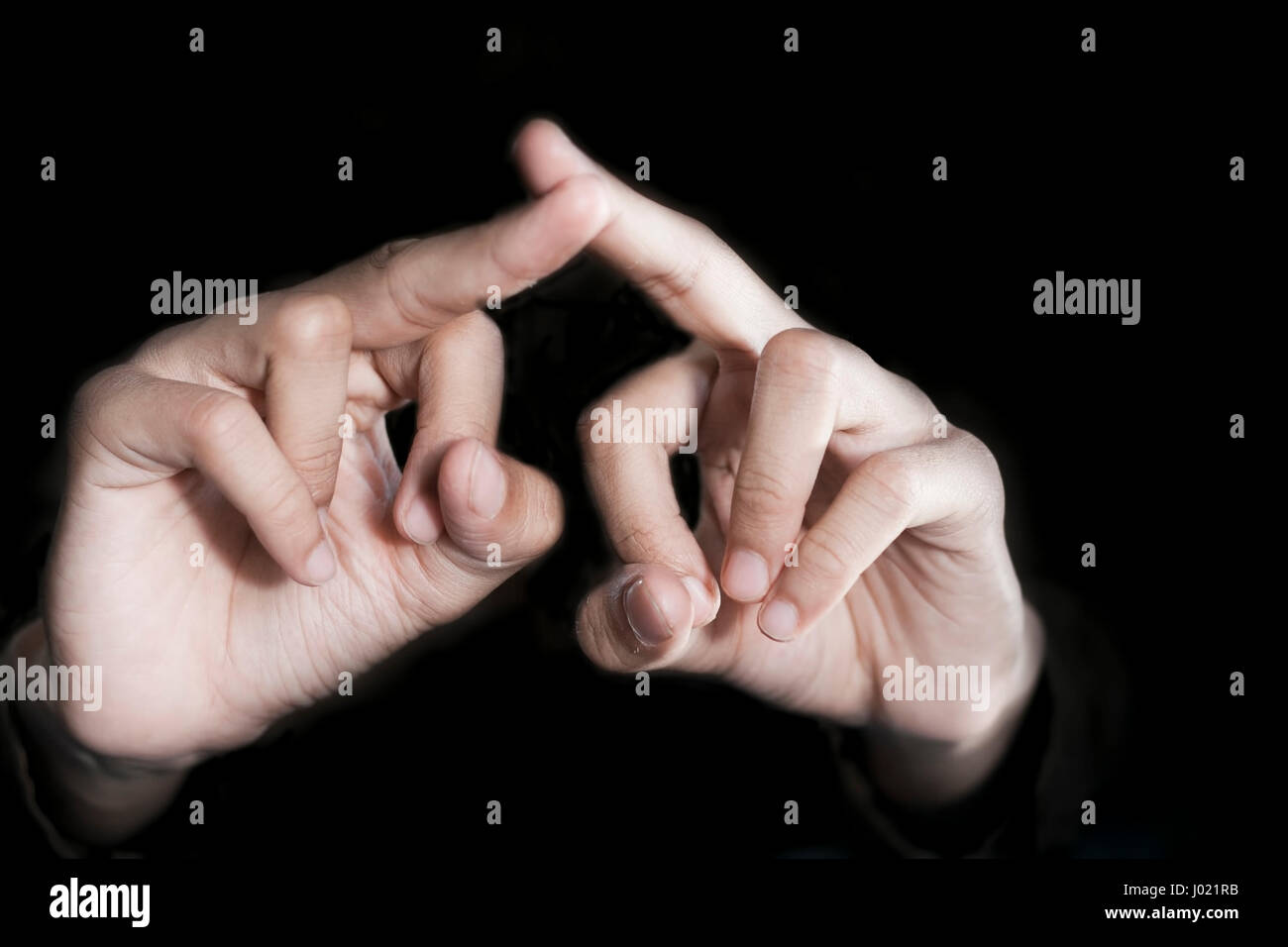 Human hand in symbolic gesture Stock Photo - Alamy