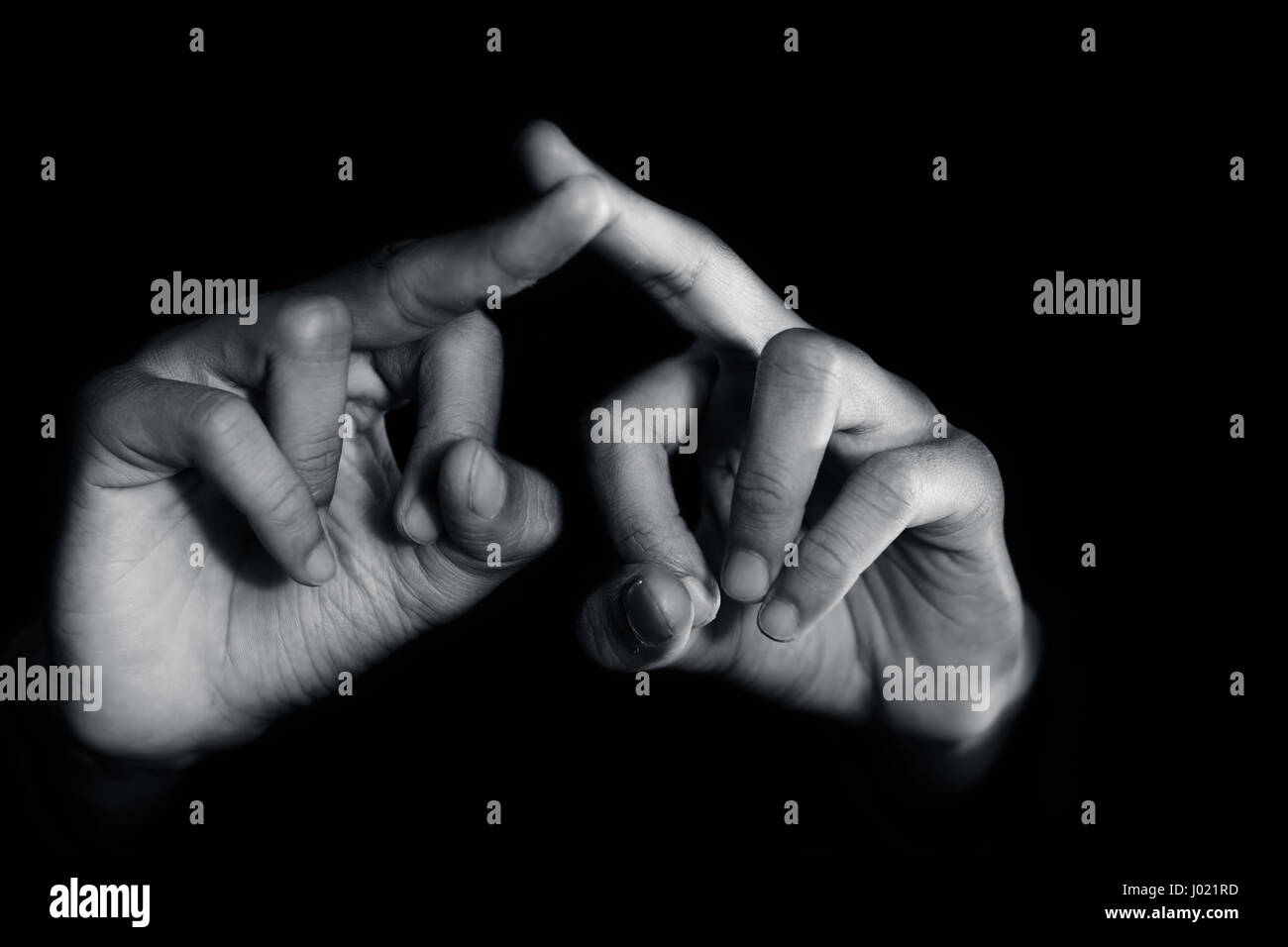 Human hand in symbolic gesture Stock Photo - Alamy
