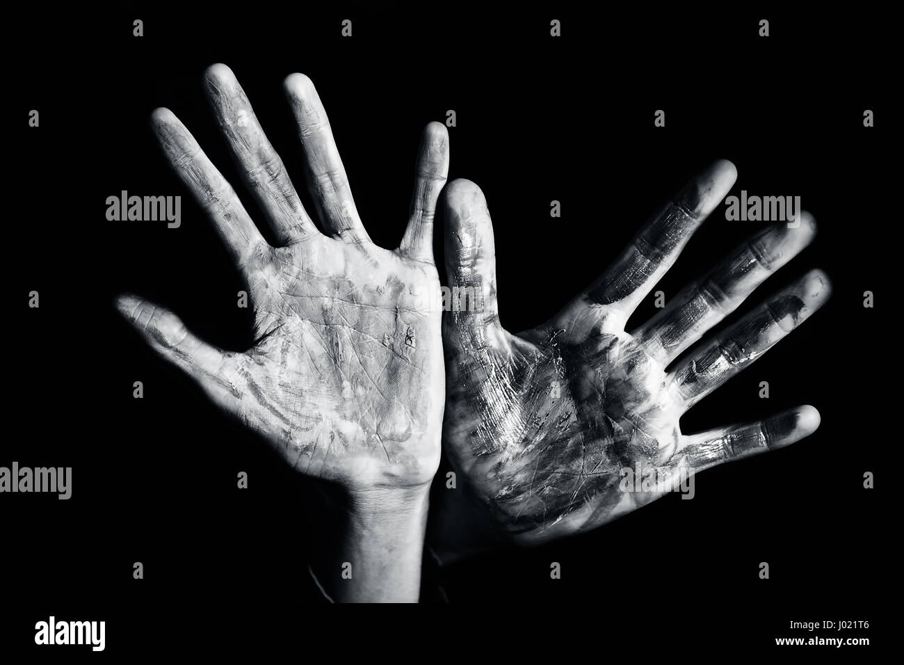 Human hands painted with poster color Stock Photo - Alamy