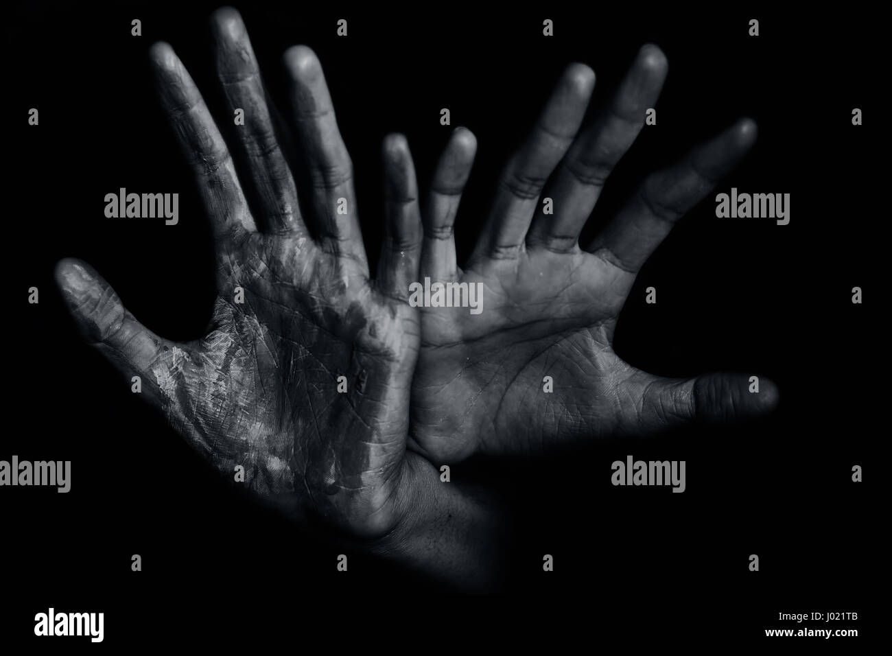 Human hands painted with poster color Stock Photo - Alamy