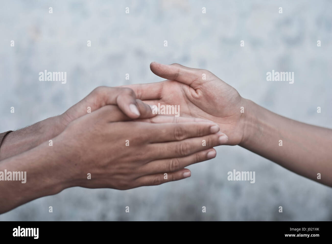 Playing hands of kids Stock Photo - Alamy