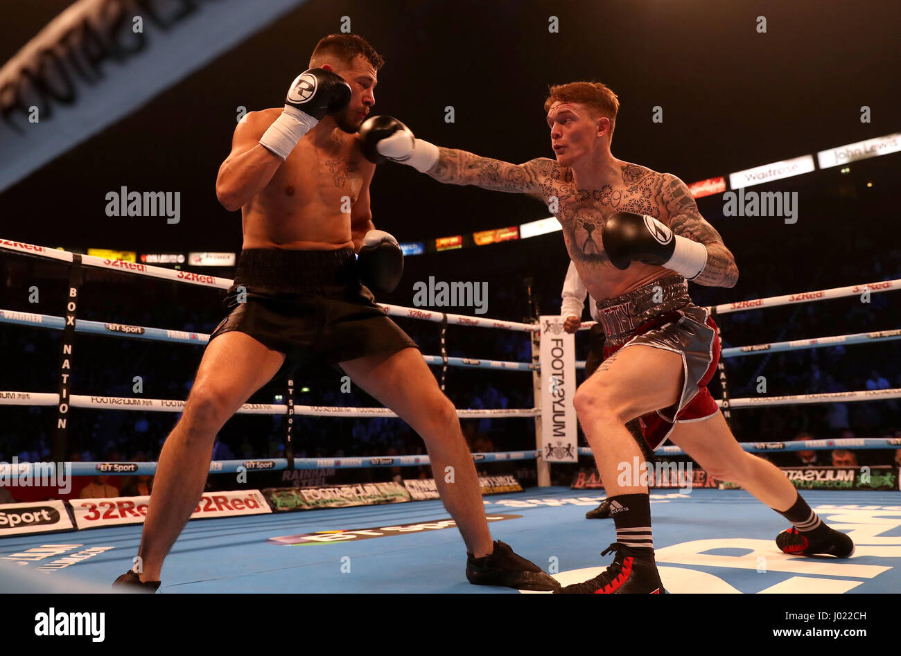 Mason Cartwright (right) takes on Sam Omidi at Manchester Arena Stock ...